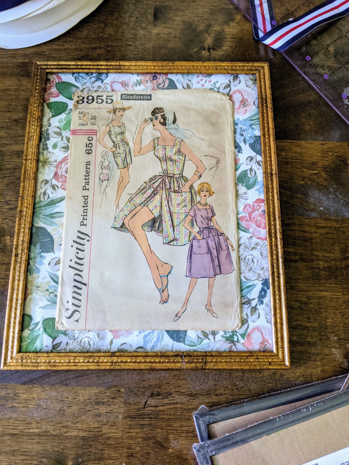 DIY Laundry Room Wall Art with Vintage Sewing Patterns - Joyfully Treasured